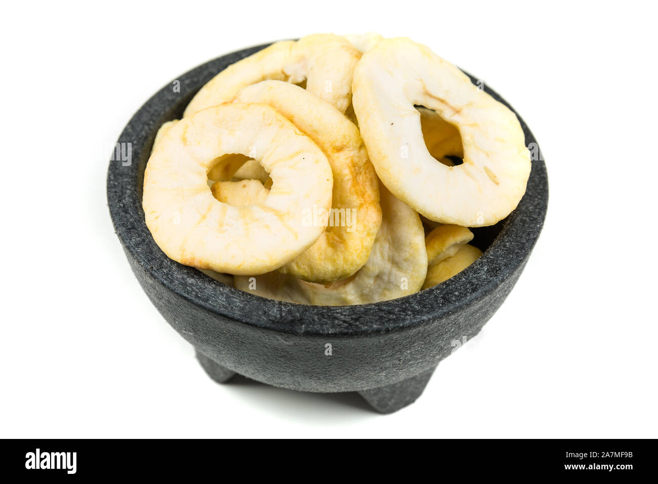Pile of dehydrated fruity apple ring snack Stock Photo - Alamy