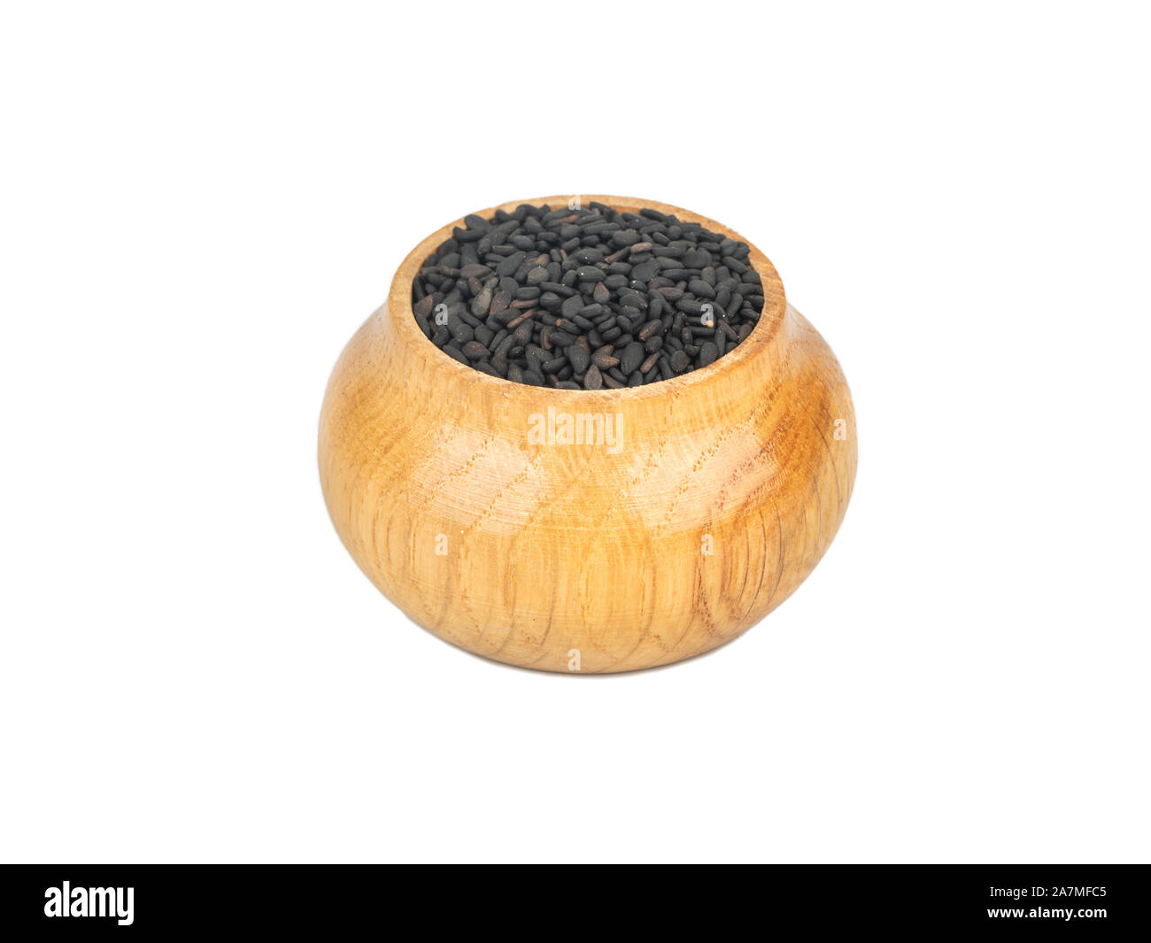 Black sesame in wooden container isolated on white background Stock ...