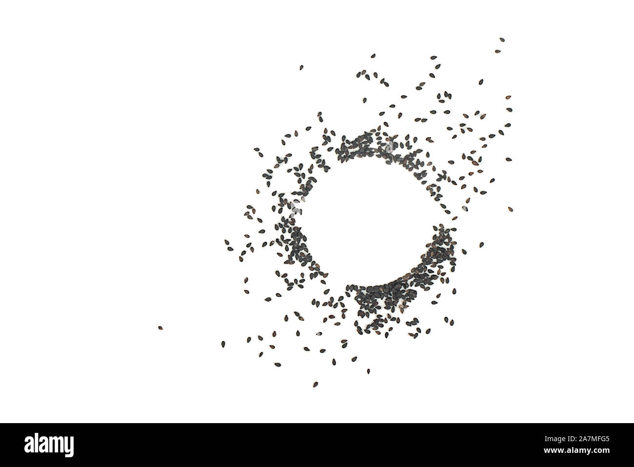 Scattered black sesame seeds with a circle on a white background Stock ...