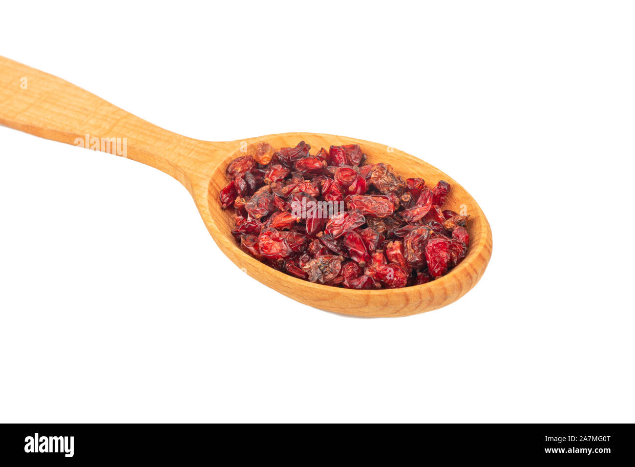 Dry barberry berries in wooden spoon close up on white background Stock ...