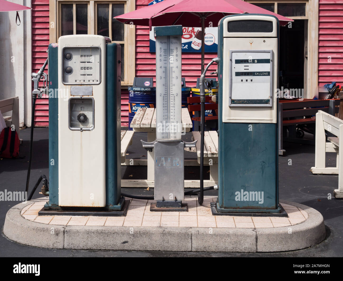 Wooden service station with vintage refueling pumps Stock Photo - Alamy