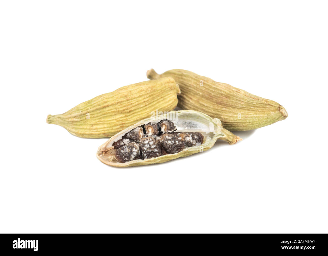 Dry cardamom with half isolated on white background Stock Photo - Alamy