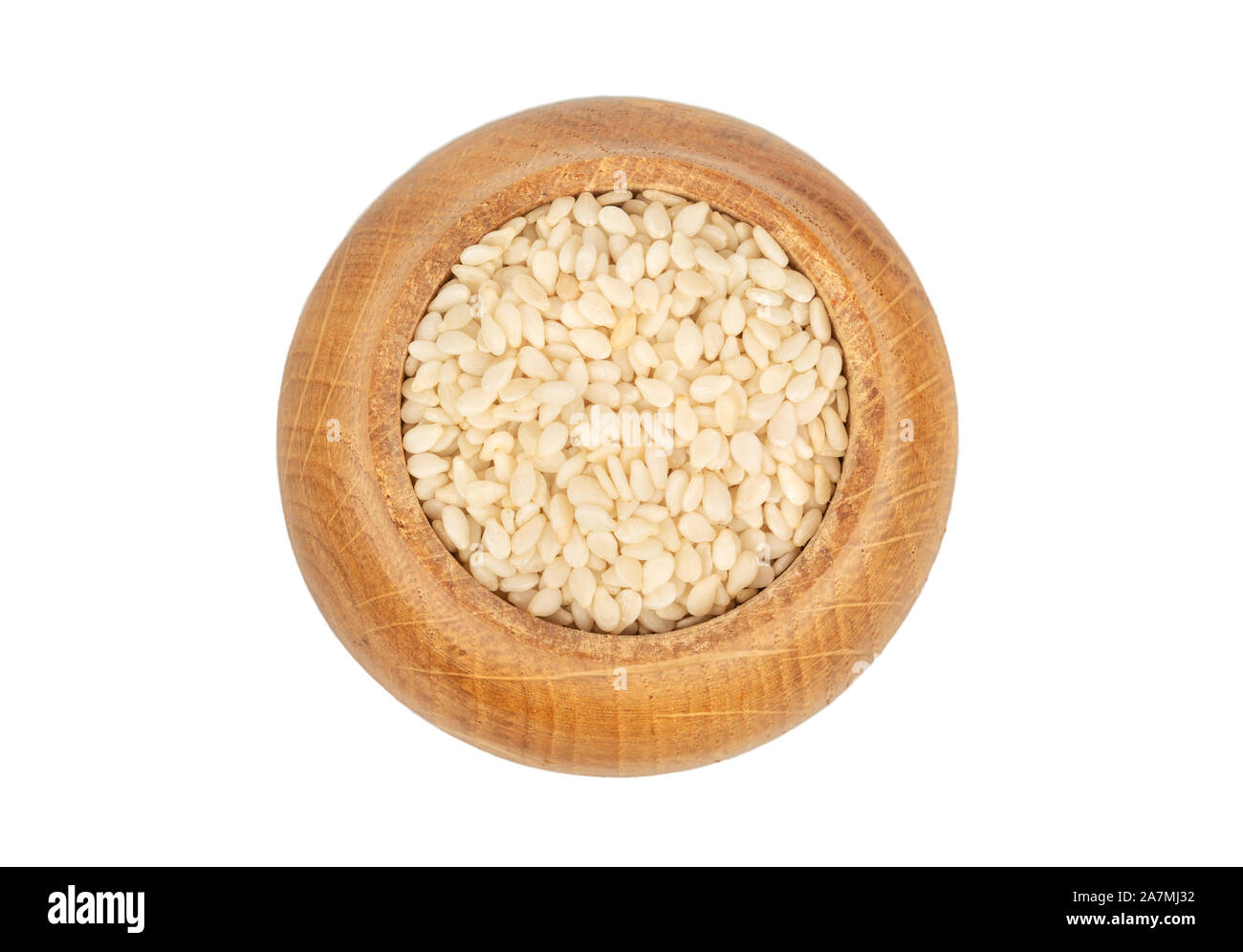 Sesame seeds in wooden container isolated on white background, top view ...