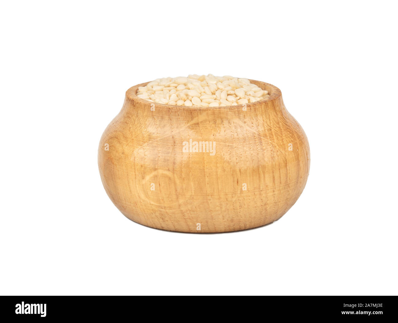 Sesame seeds in wooden container isolated on white background Stock ...