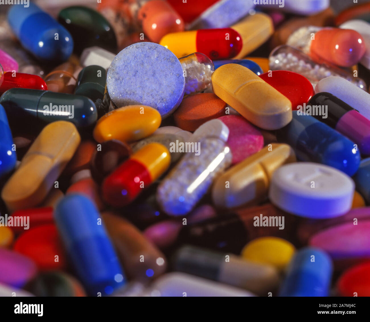 Different colourful pill capsules hi-res stock photography and images ...
