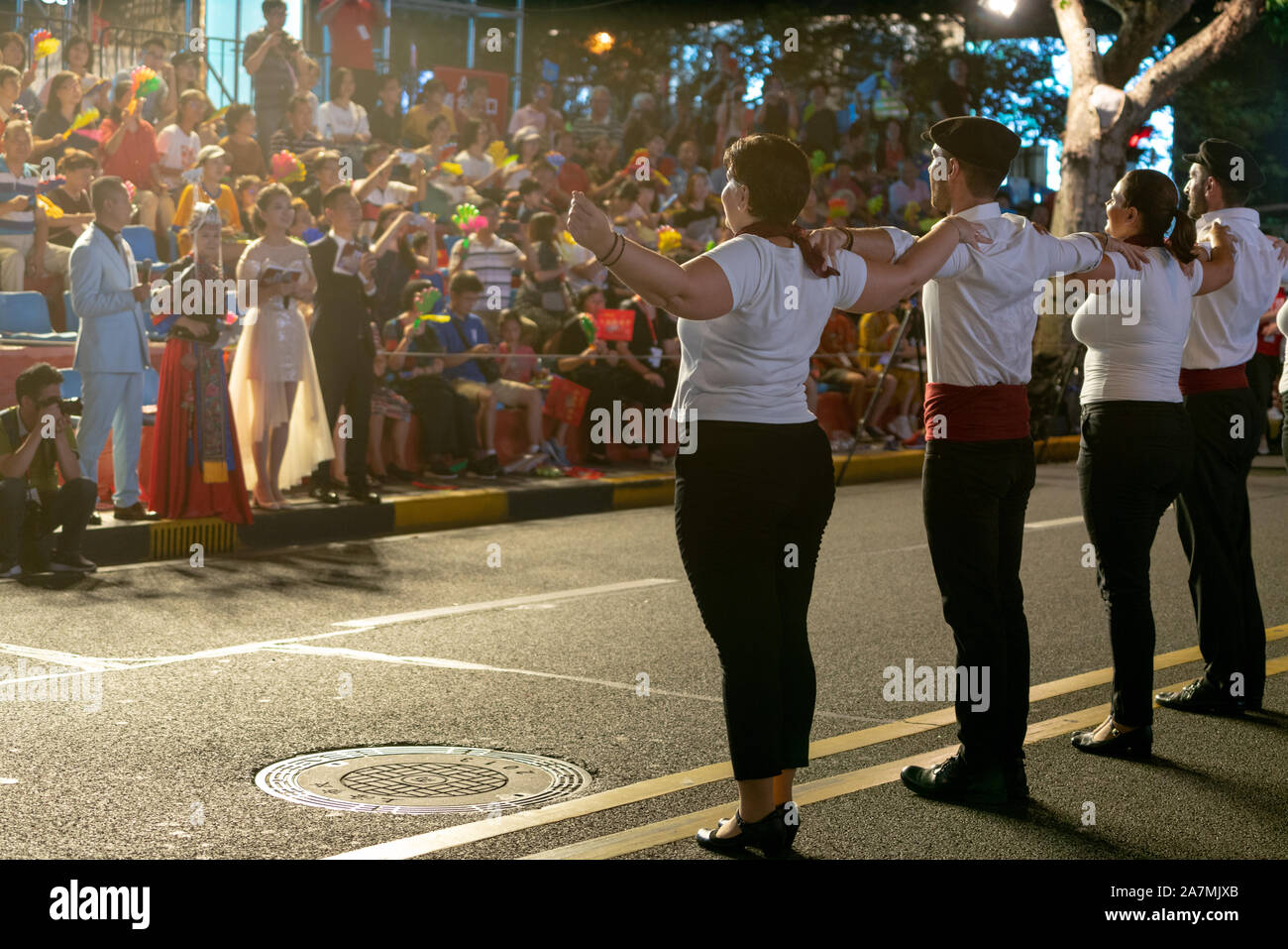 Performers dance and play the instruments during the fancy parade of ...