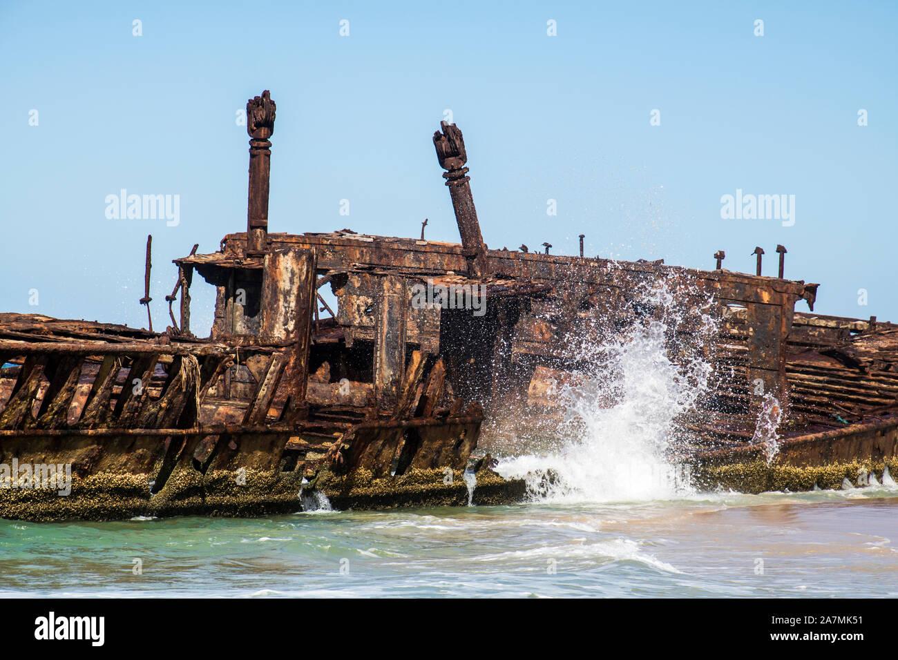Photograph of the shipwreck of the SS Maheno on Fraser Island with a ...
