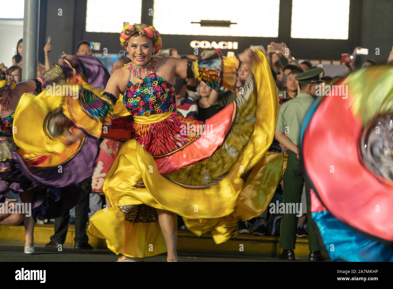 Performers dance and play the instruments during the fancy parade of ...
