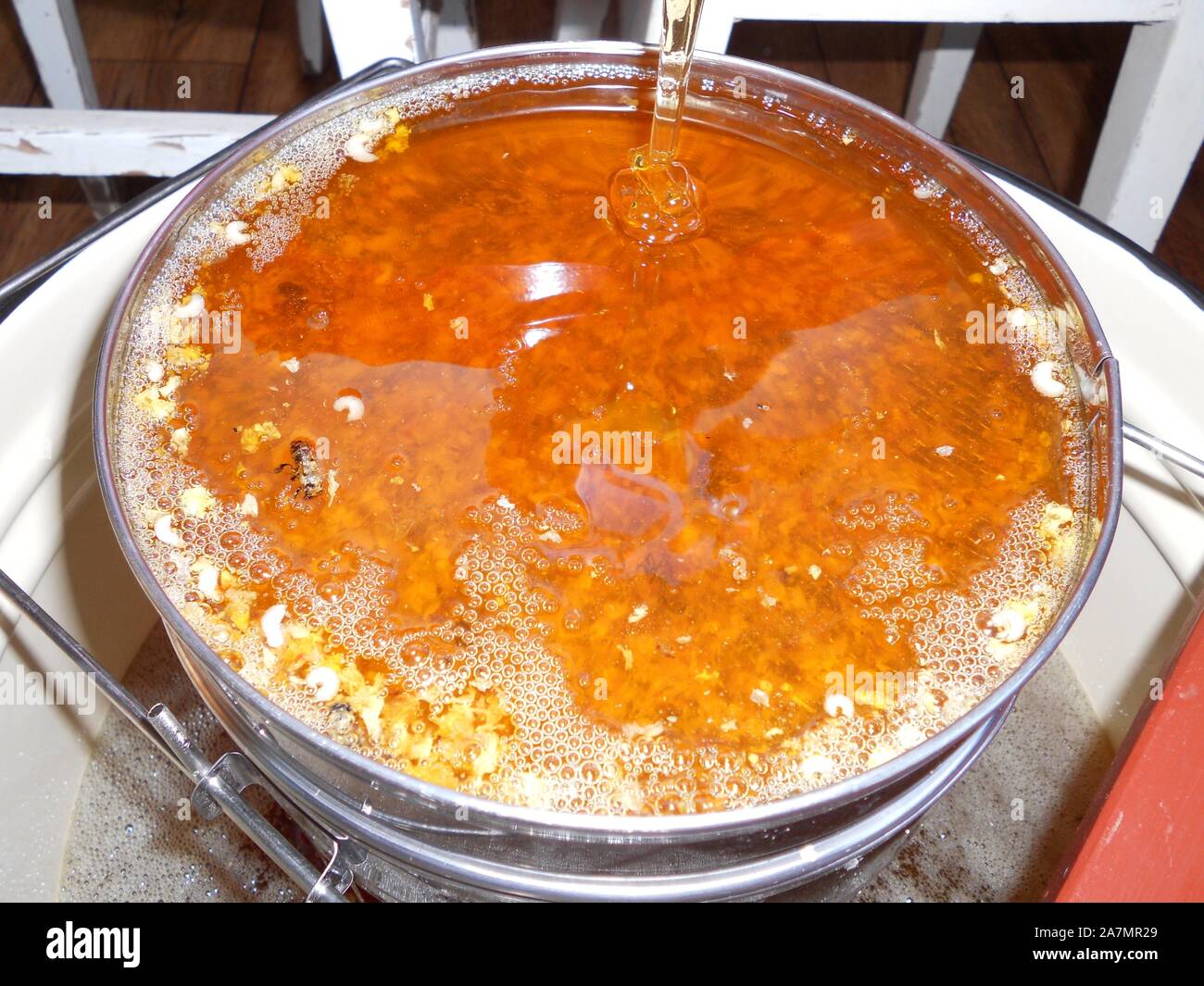 Background texture, dropping drops of sweet honey, nectar in mead ...
