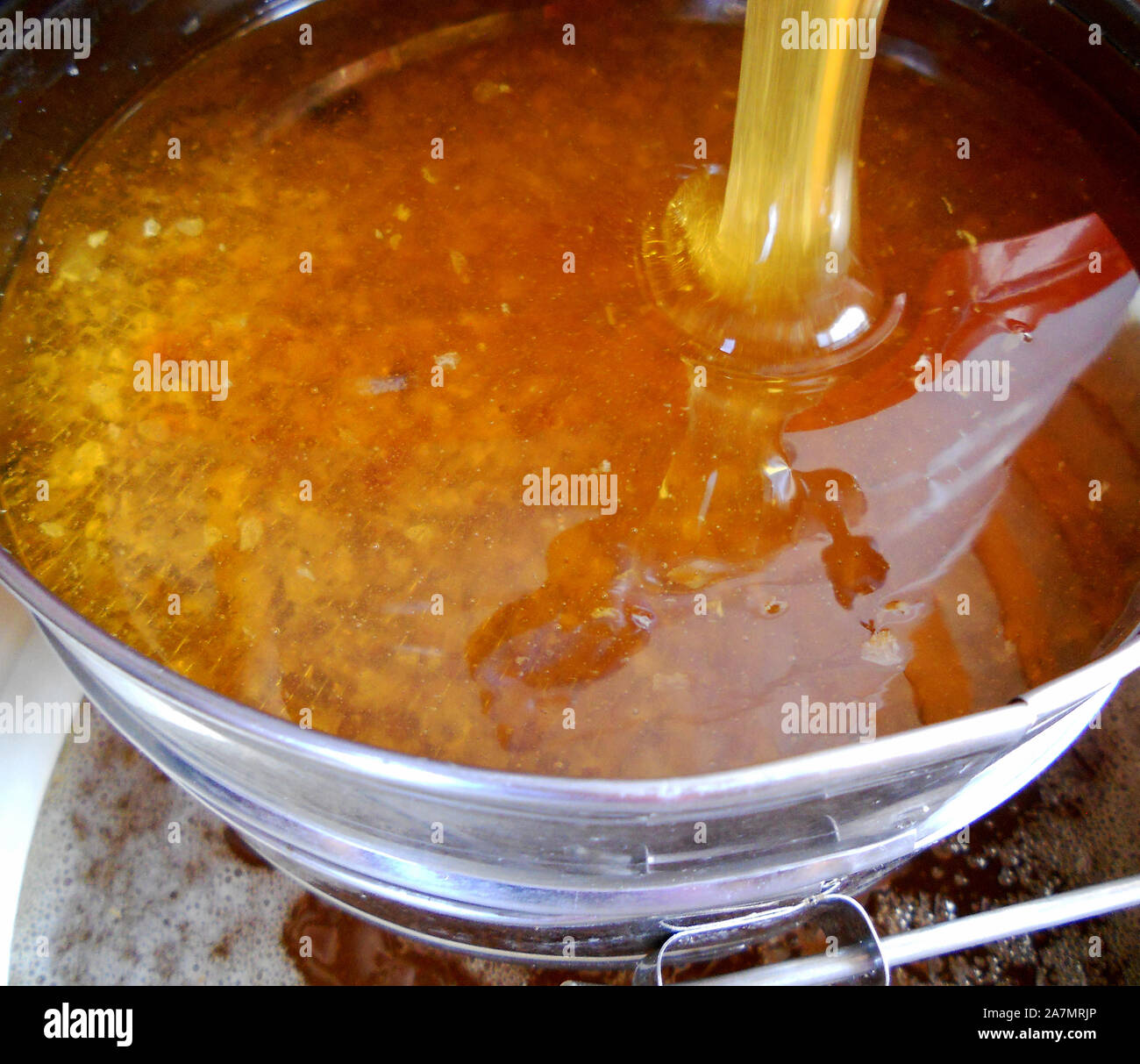 Background texture, dropping drops of sweet honey, nectar in mead ...