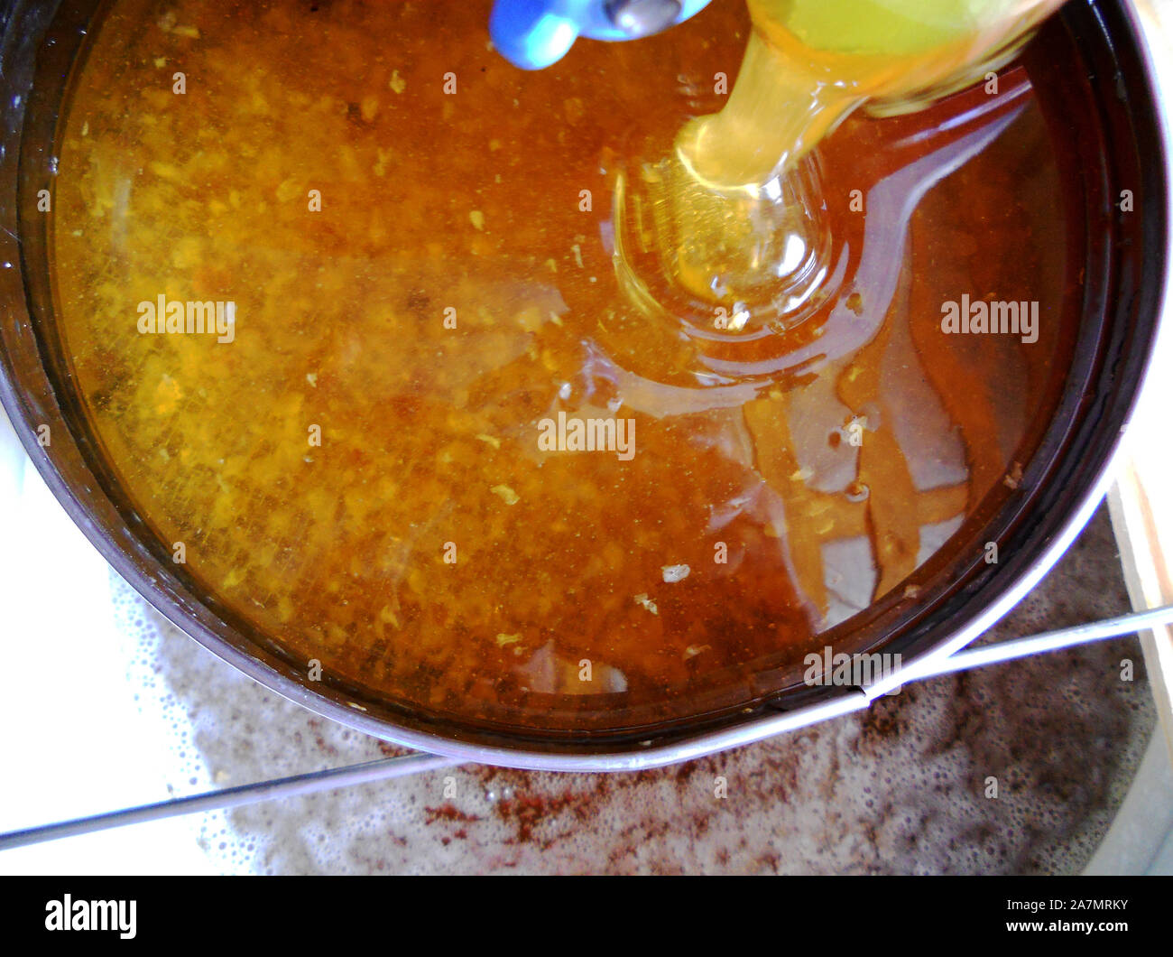 Background texture, dropping drops of sweet honey, nectar in mead ...