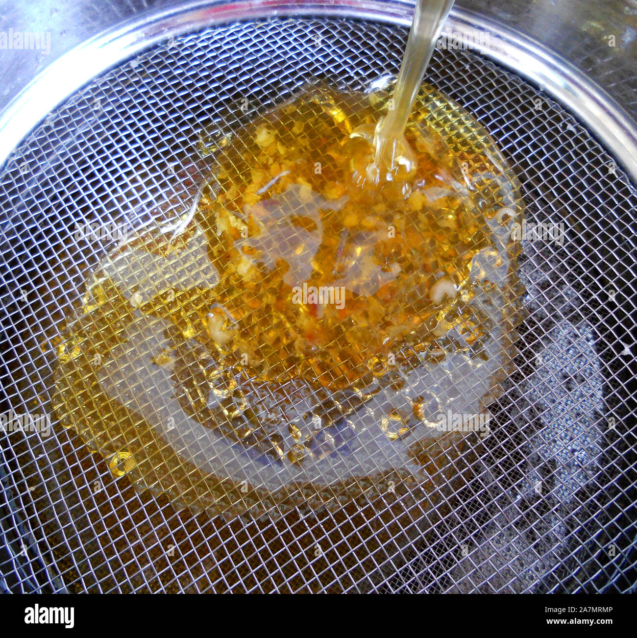 Background texture, dropping drops of sweet honey, nectar in mead ...