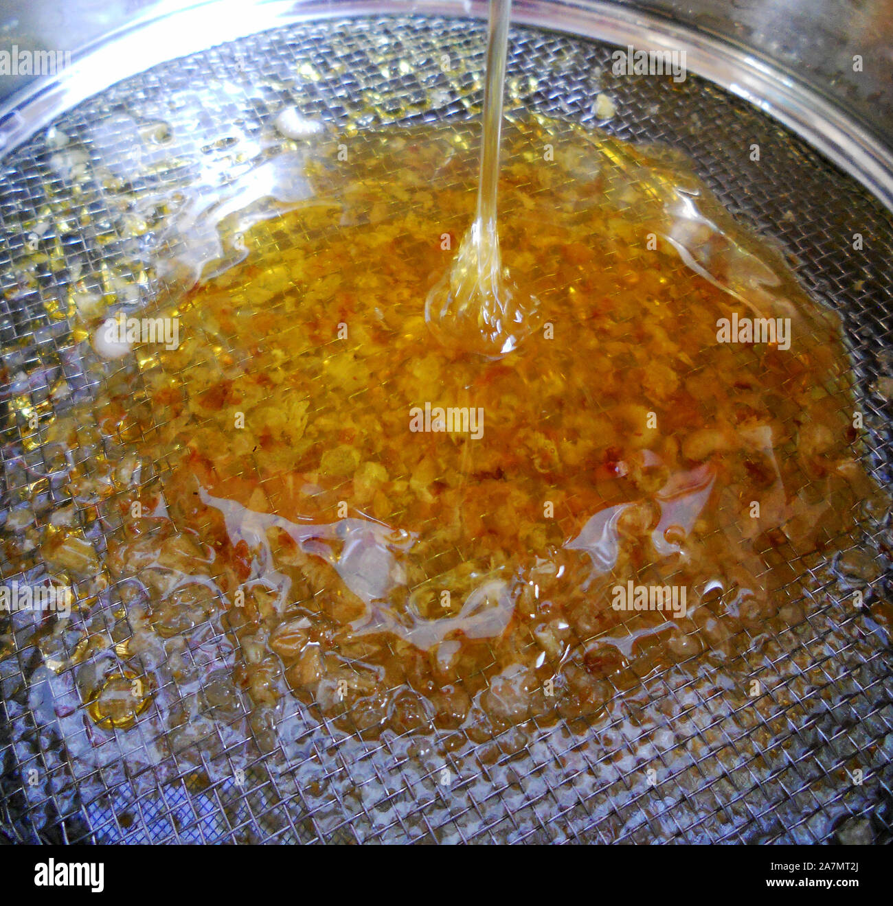 Background texture, dropping drops of sweet honey, nectar in mead ...