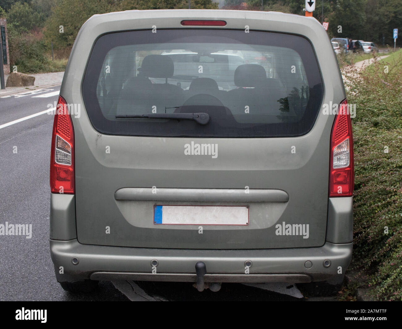 Empty License plate on the back of a grey van Stock Photo - Alamy