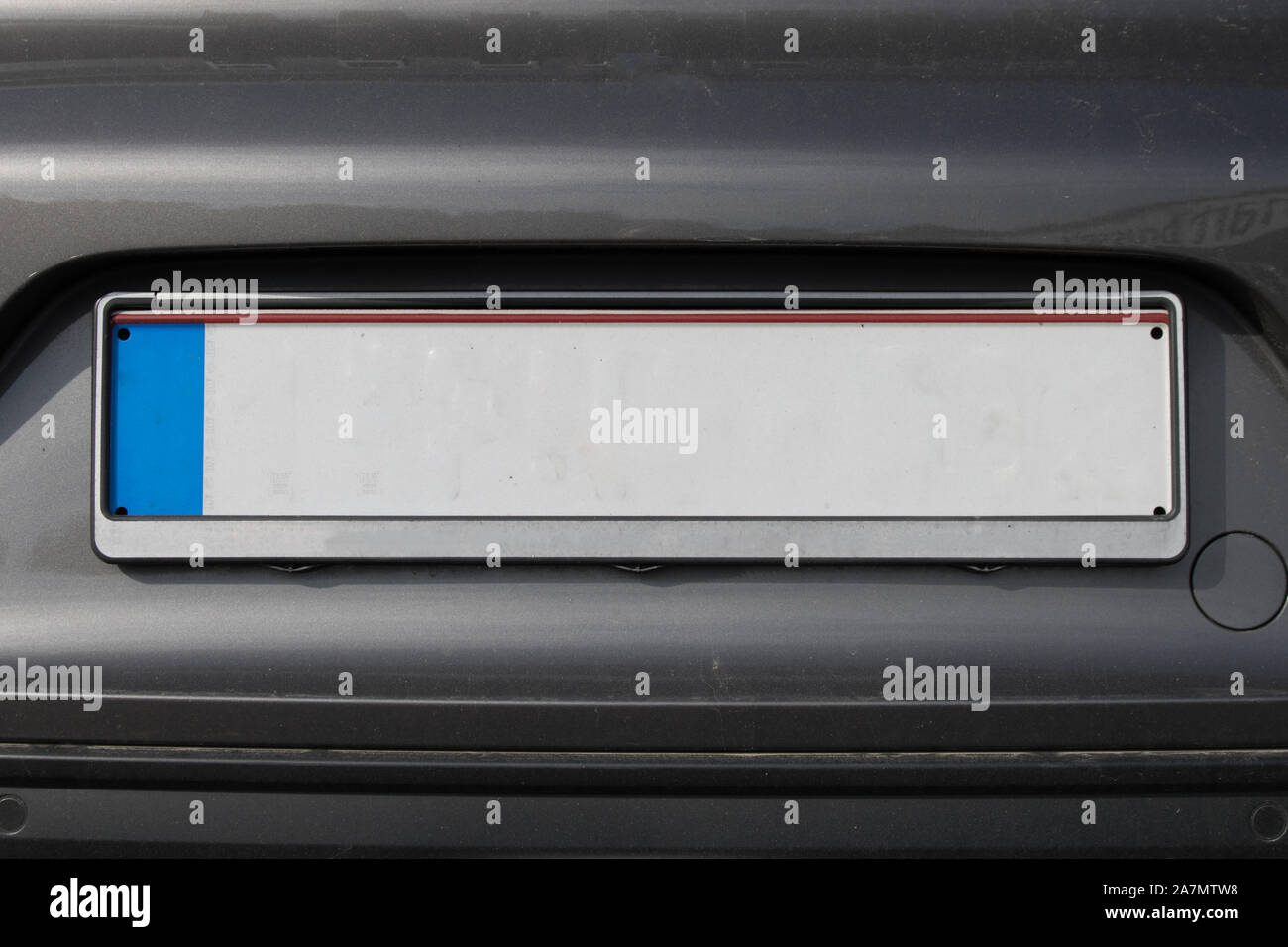 Empty License plate on the back of a sports car Stock Photo - Alamy