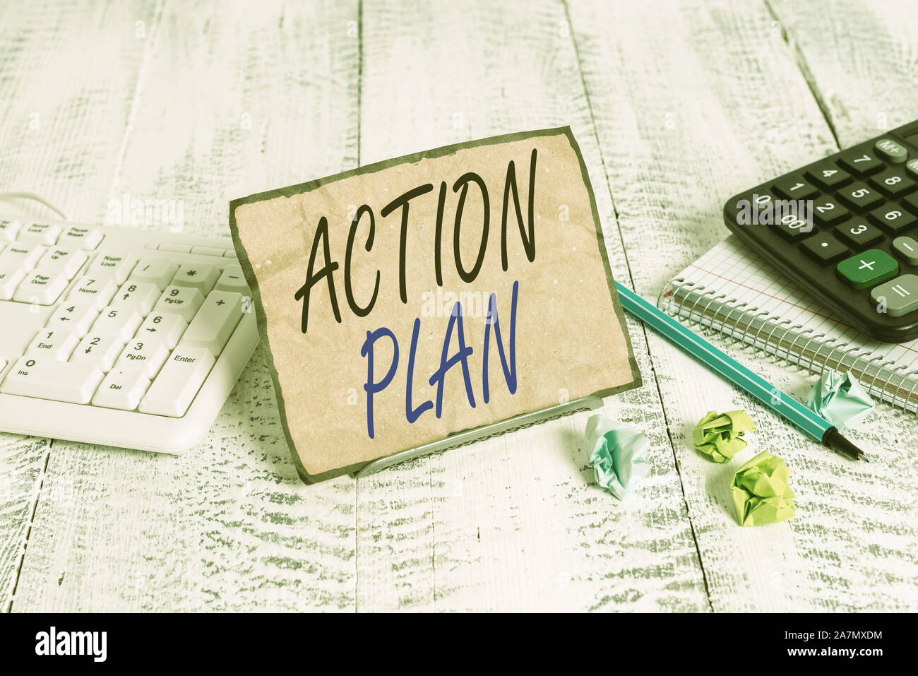 Writing note showing Action Plan. Business concept for detailed plan ...
