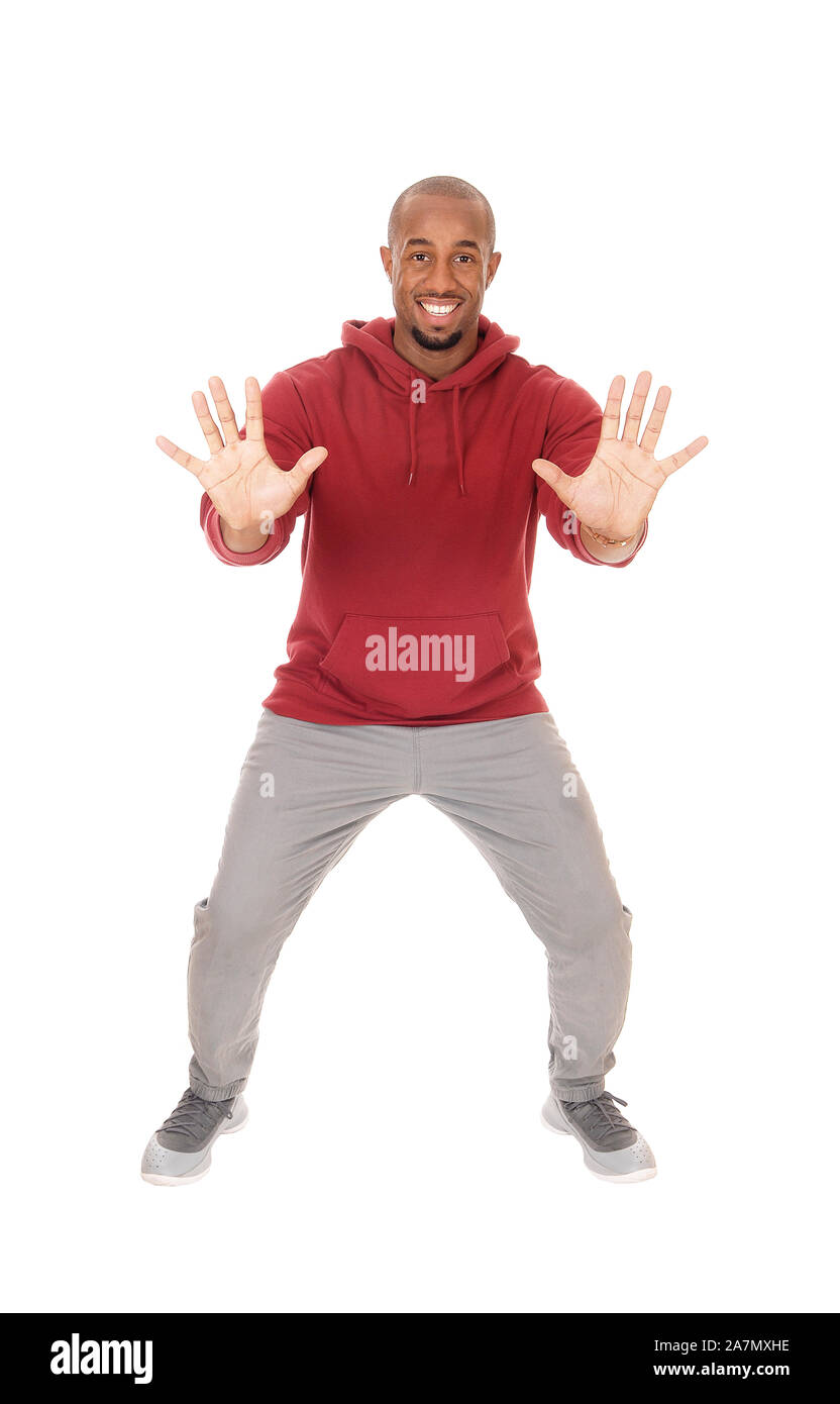 A tall handsome African American man standing in the studio with his ...