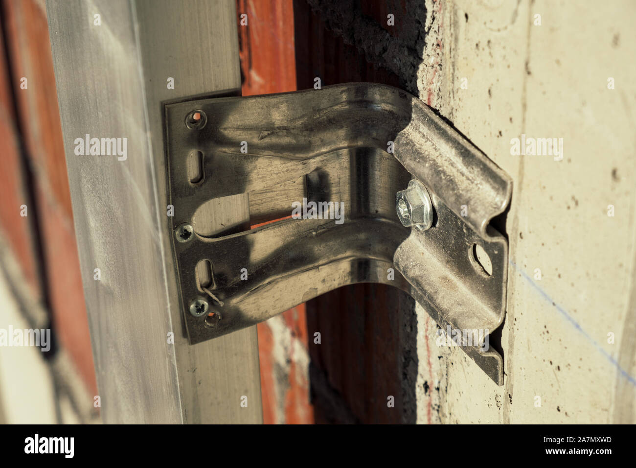 Aluminum anchor fixed in the wall for ventilated facade installation ...
