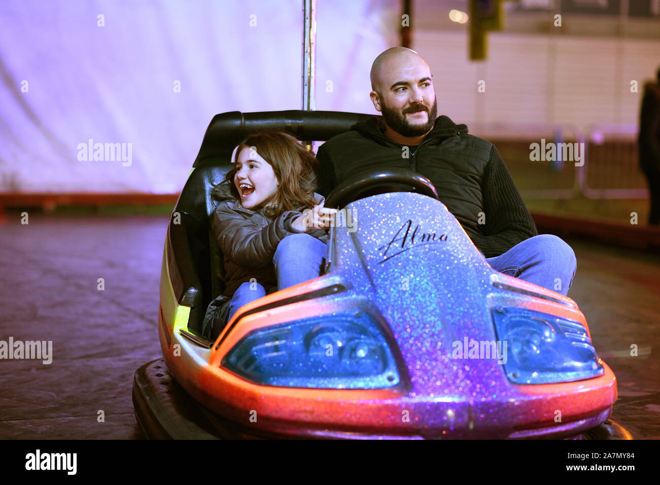 Fairground ride dodgem cars Britain Uk children kids enjoying ...