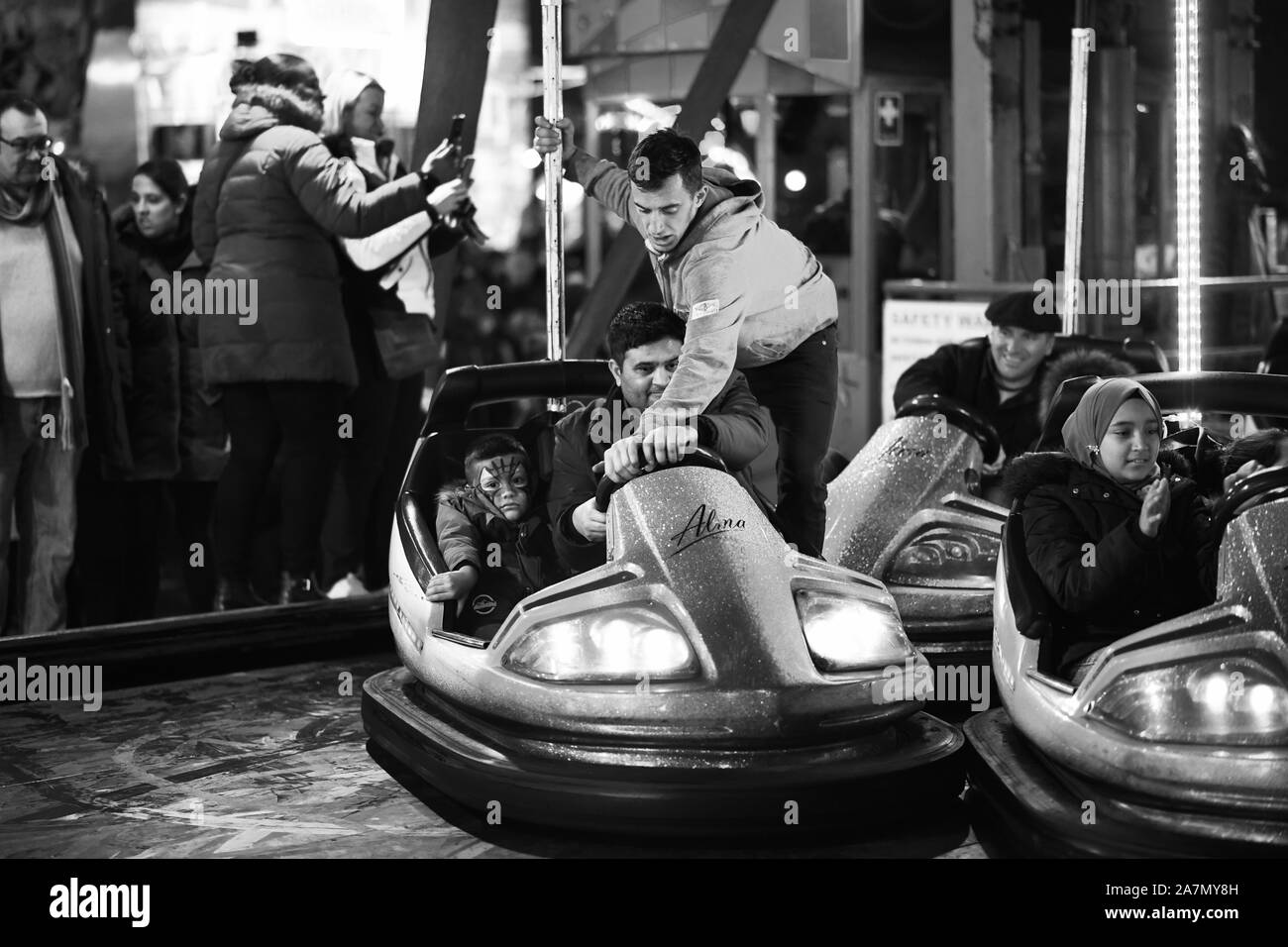 Fairground ride dodgem cars Britain Uk children kids enjoying ...