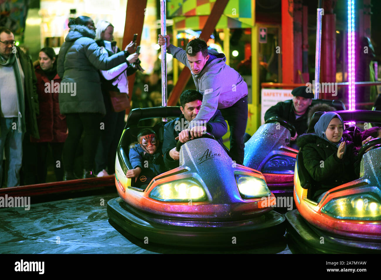 Fairground ride dodgem cars Britain Uk children kids enjoying ...