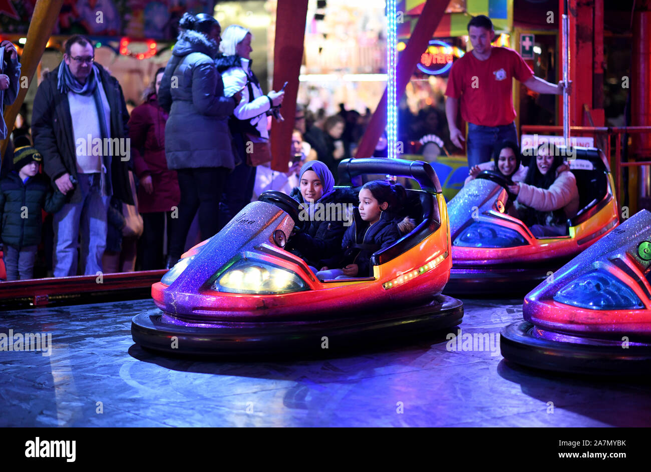 Fairground ride dodgem cars Britain Uk children kids enjoying ...