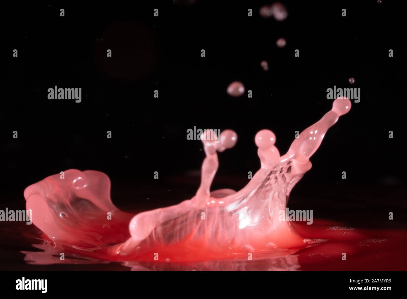 Dynamic wet ink splash hi-res stock photography and images - Alamy