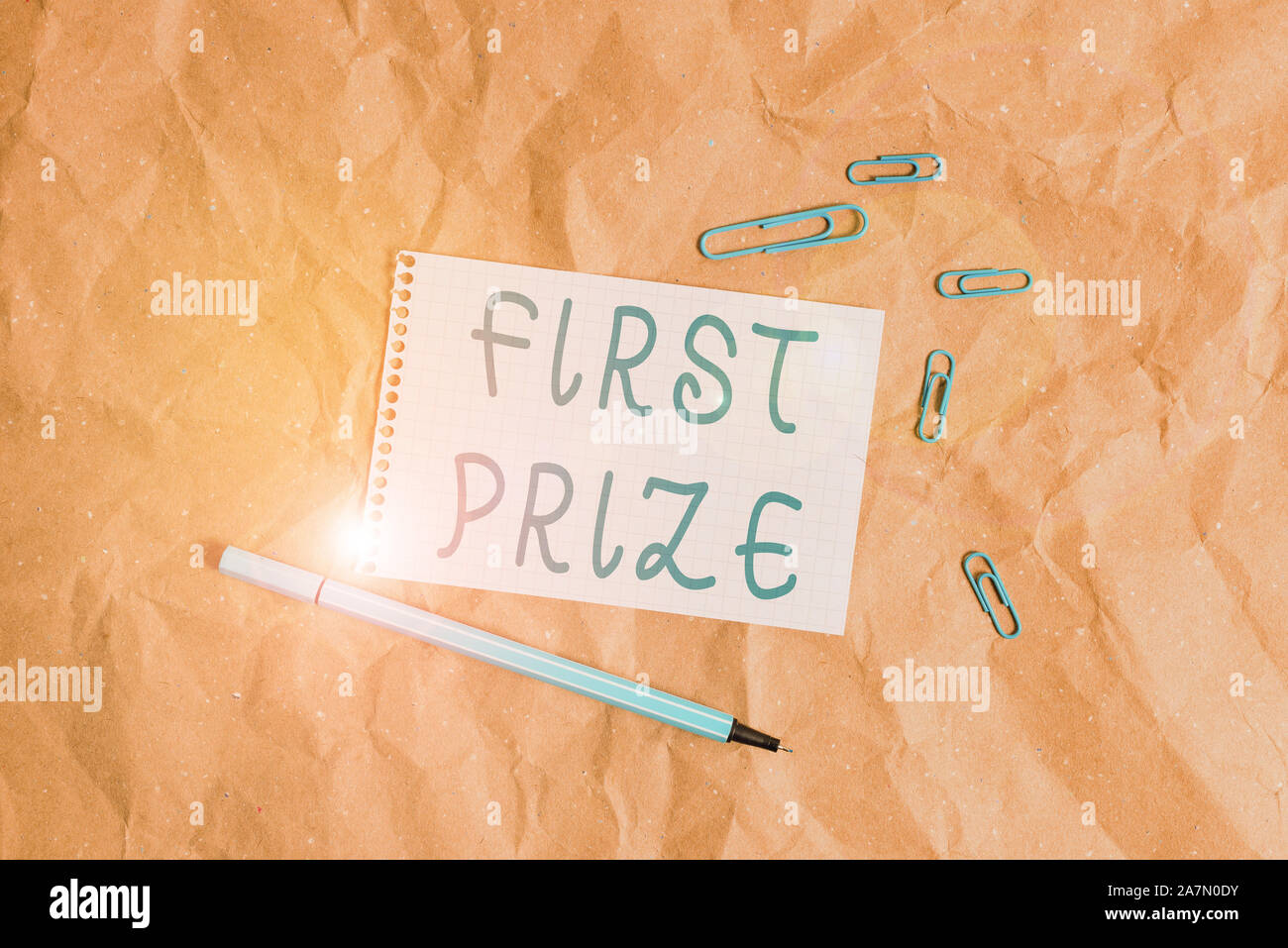Writing note showing First Prize. Business concept for the most ...