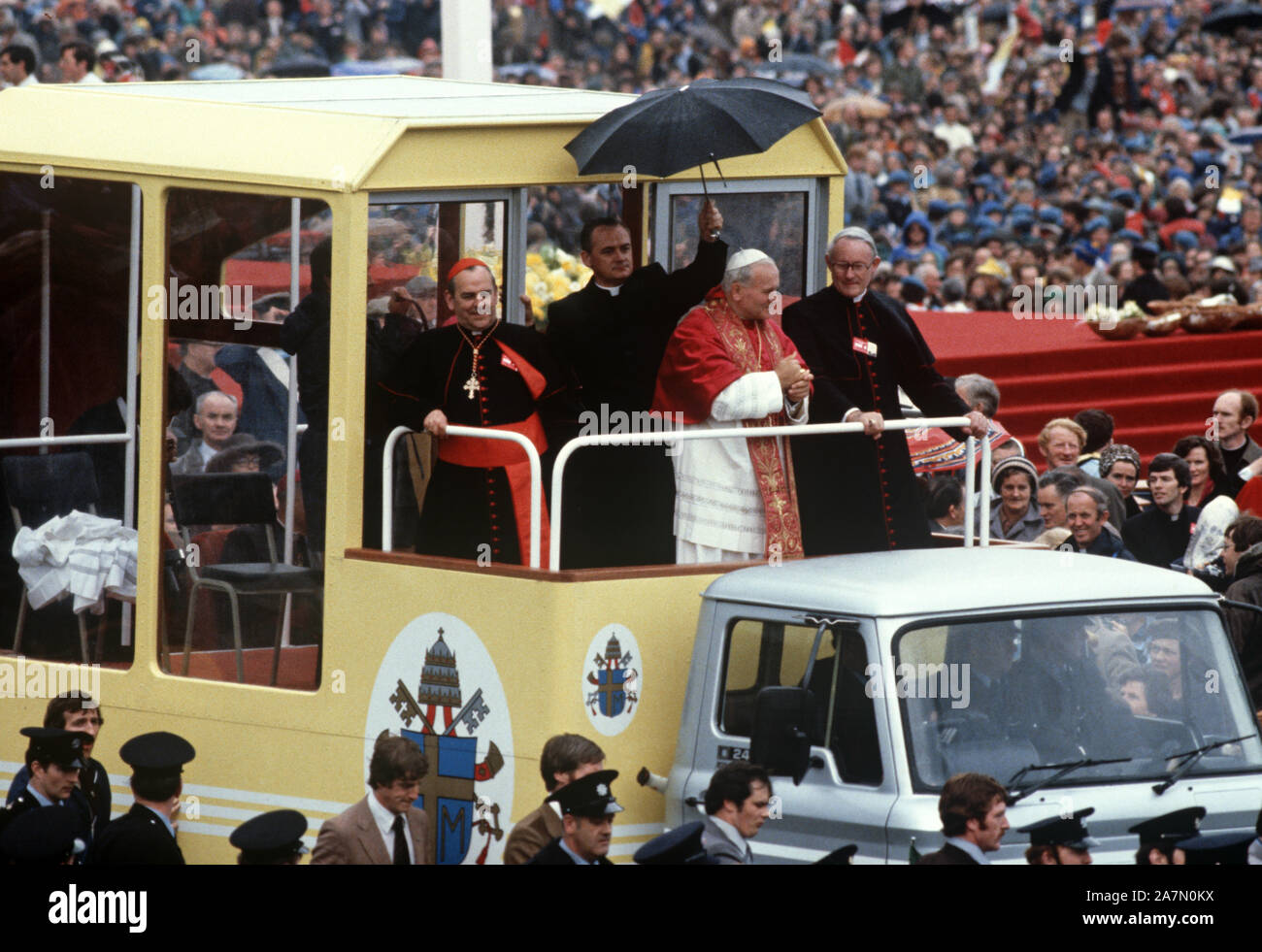 Pope John Paul II's visit to Ireland using the popemobile , 1979 Stock ...