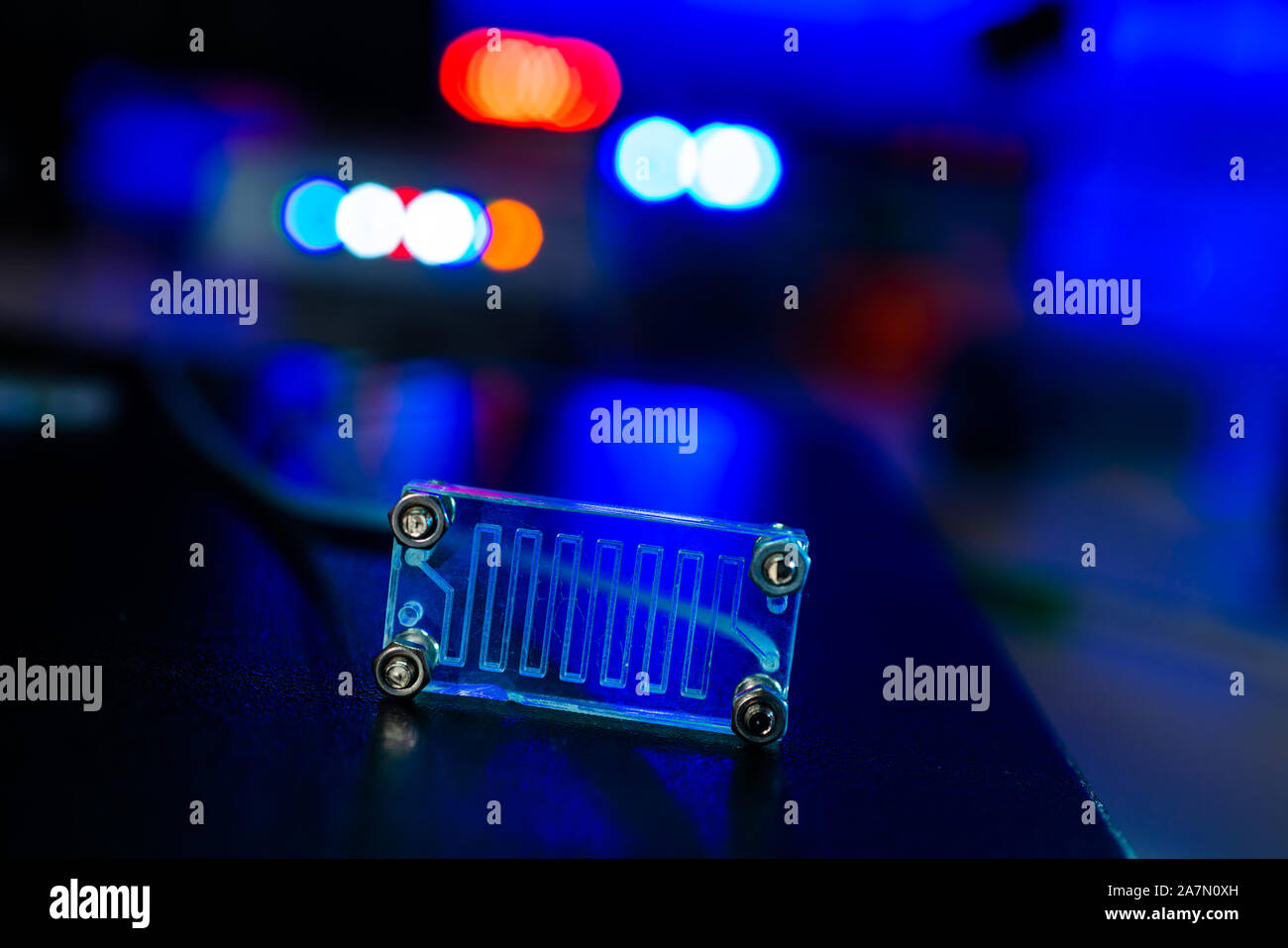 microfluidic device Instrument that uses micro amounts of fluid on a ...
