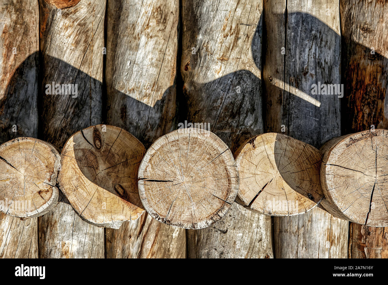 texture of logs, masonry coupling of wooden logs with cuts. Copy Space ...