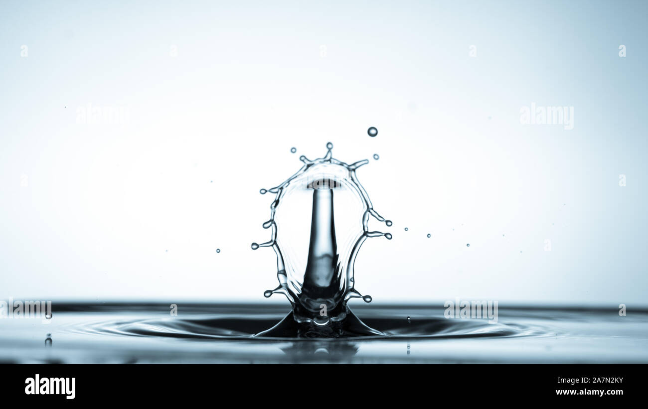 Macro shot of a water drop collision. abstract water splash Stock Photo ...