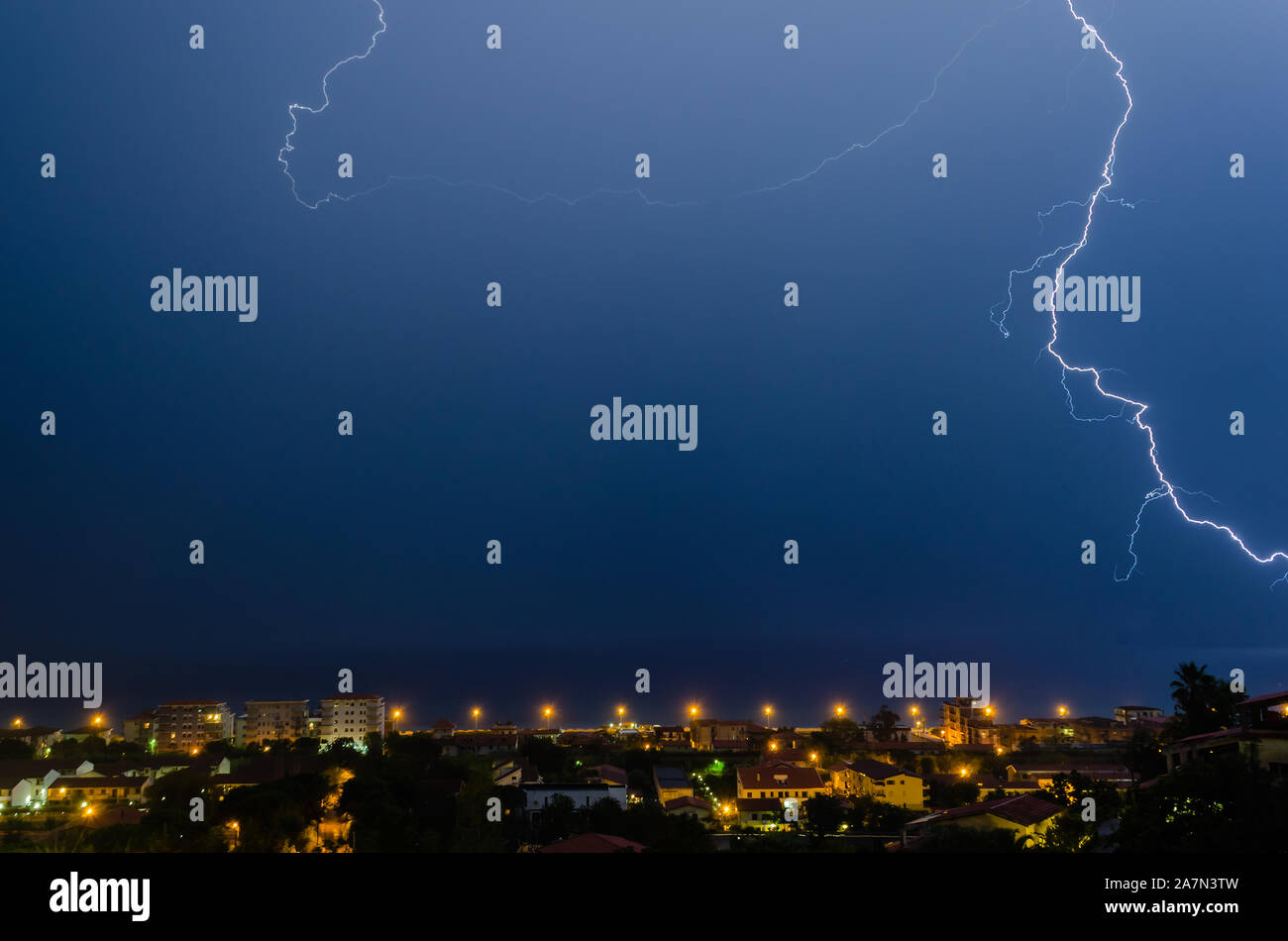 Lightning over the sea, night scene Stock Photo - Alamy