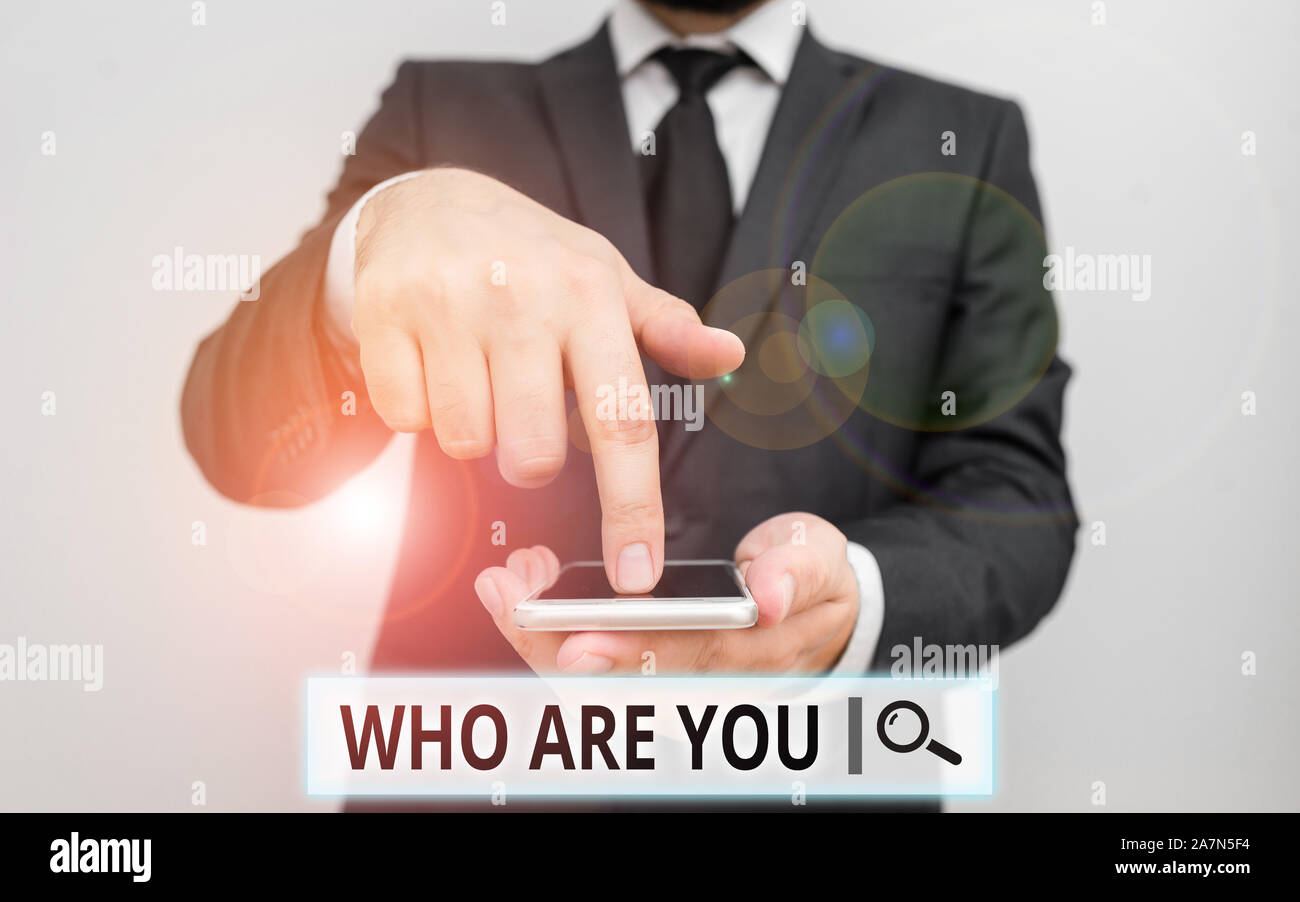 Text sign showing Who Are Youquestion. Business photo text someone ... Text sign showing Who Are Youquestion. Business photo text someone ...
