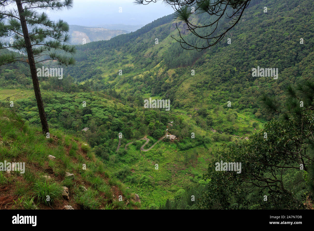 View of valley village and huge mountain range in it's background Stock ...