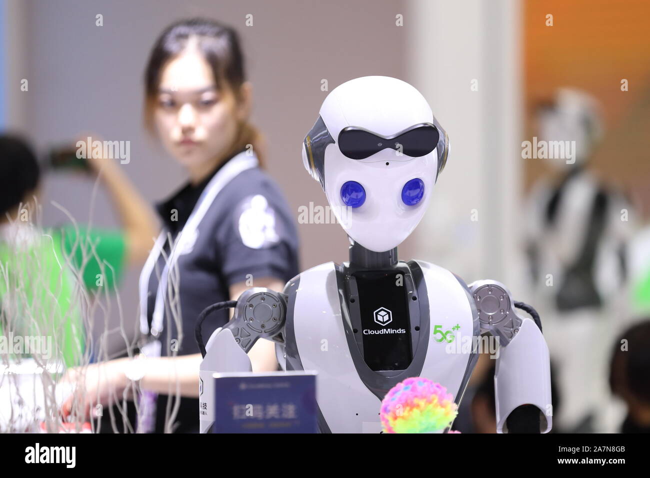 An intelligent robot is displayed at the stand of cloudminds during the ...