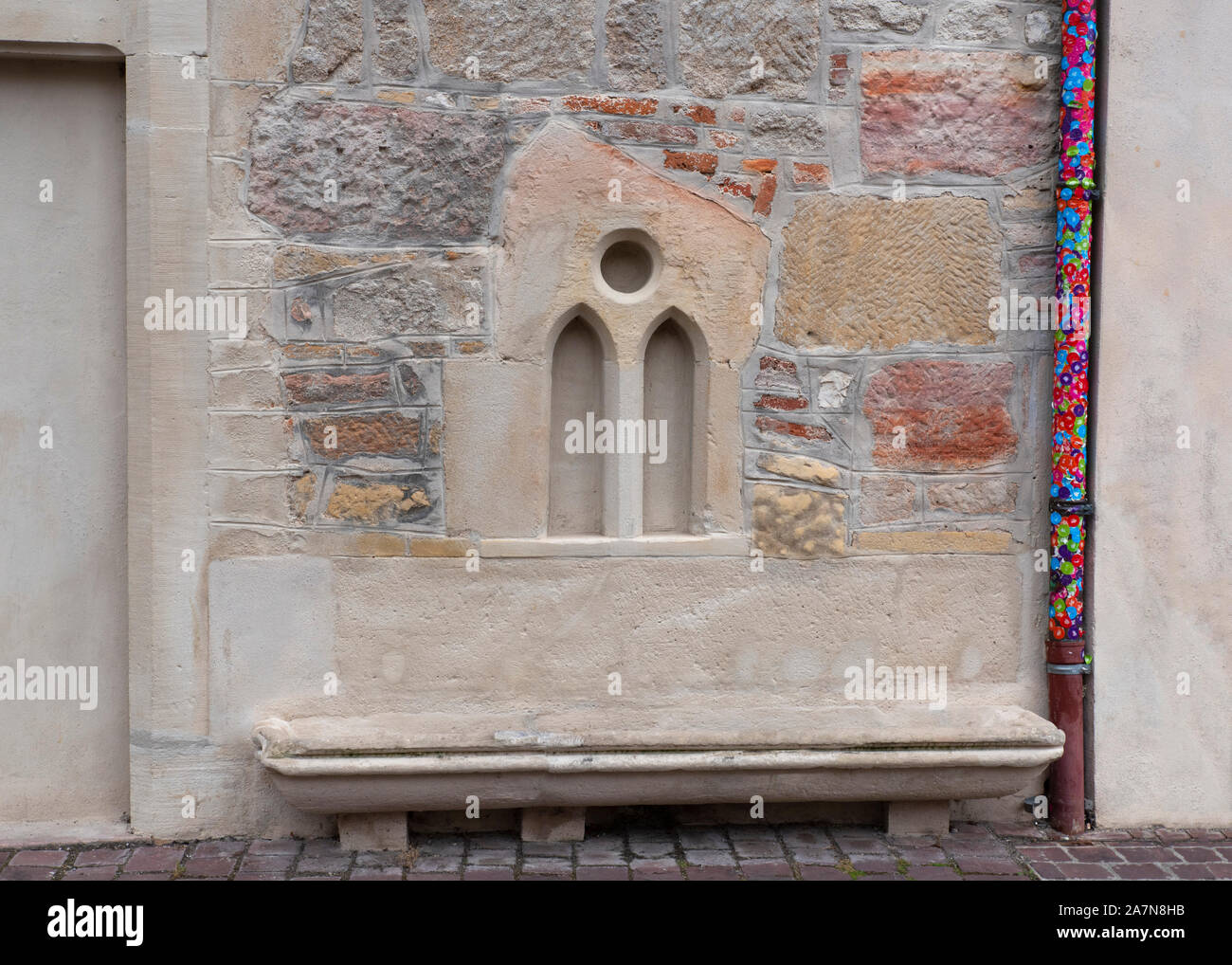 Medieval bench wall hi-res stock photography and images - Alamy