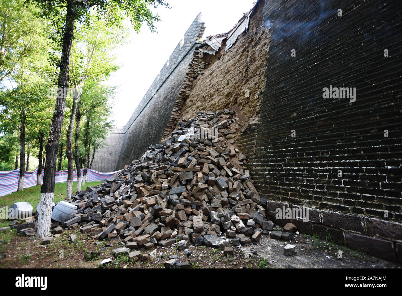 A city wall of Ming dynasty (1368-1644) is collapsed due to continuous ...