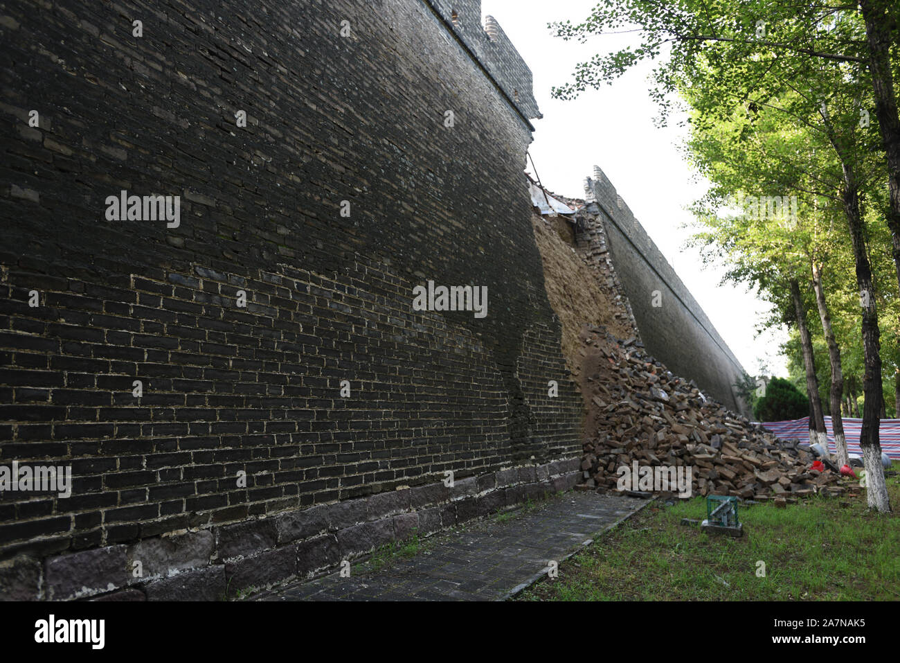 A city wall of Ming dynasty (1368-1644) is collapsed due to continuous ...