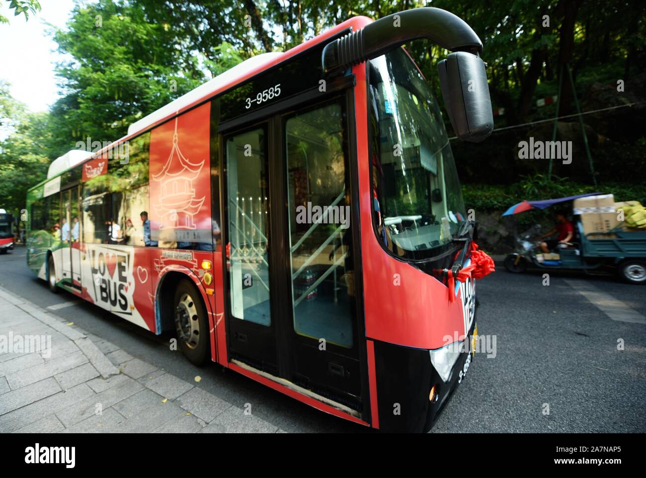 An electric bus of BYD of Hangzhou bus line 1314 is painted with "Love ...