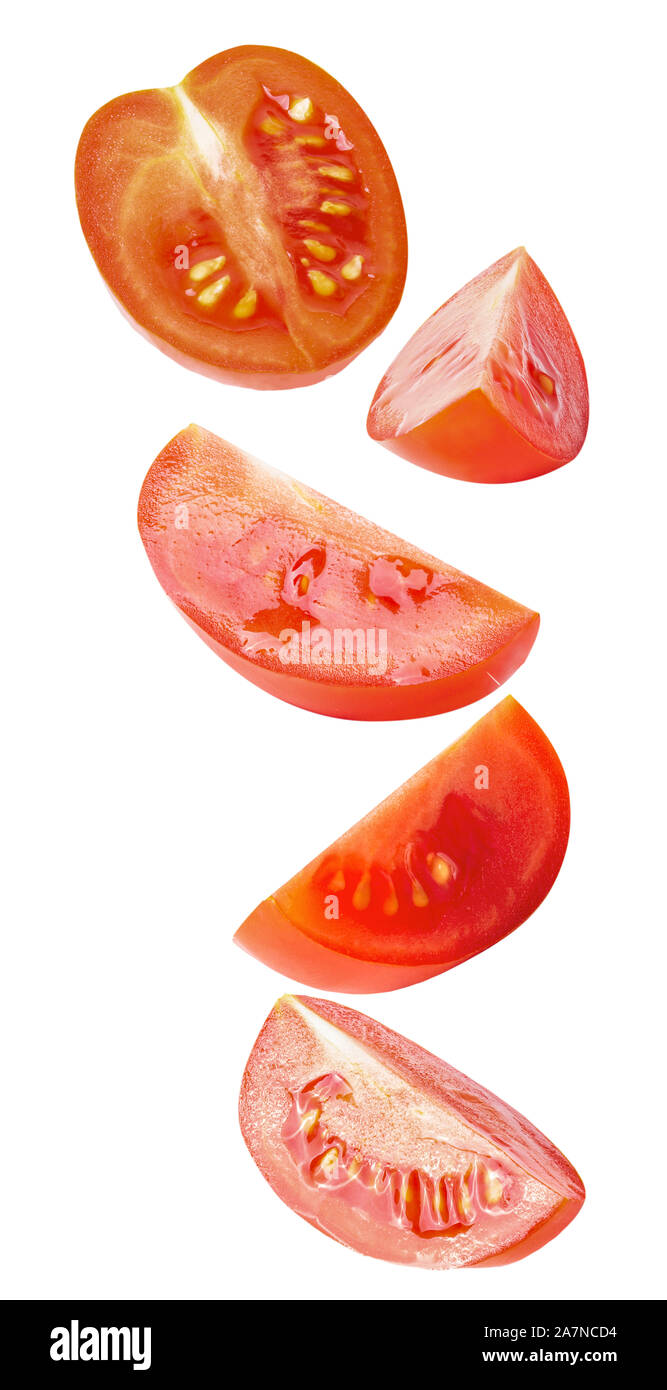 Vibrant falling vegetables isolated on white background Stock Photo - Alamy