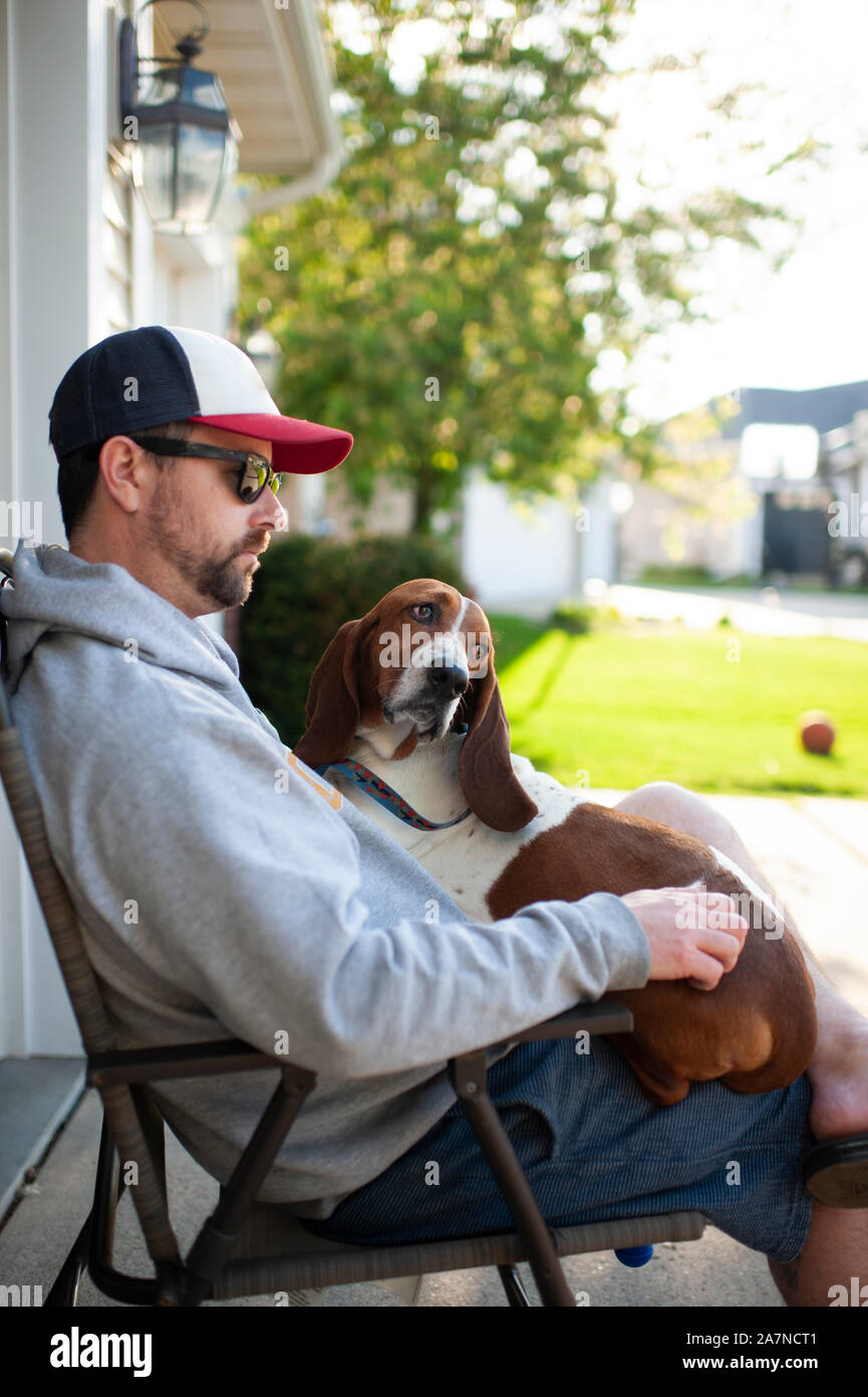 Lap Dog Man High Resolution Stock Photography and Images - Alamy