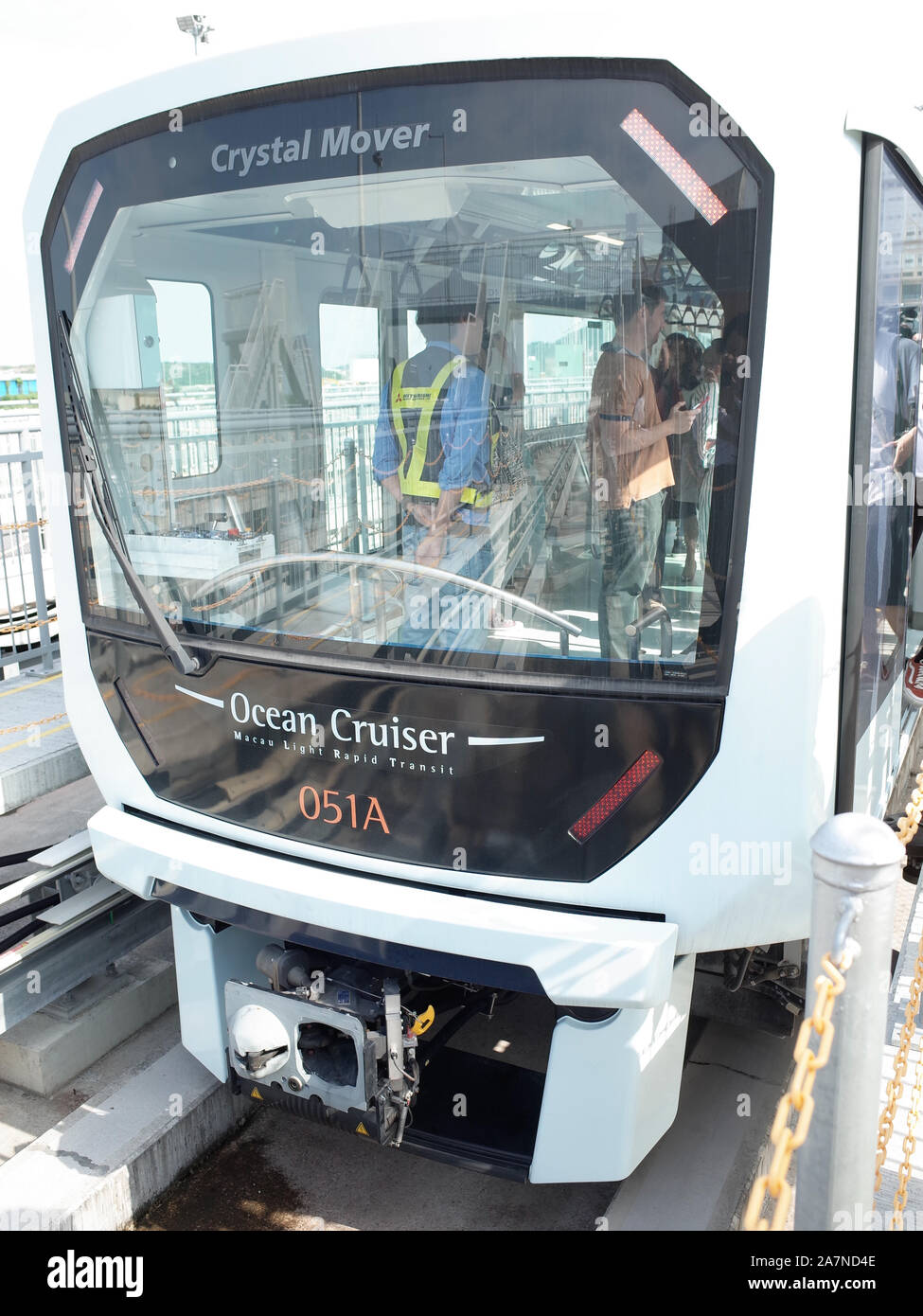 Chinese workers introduce the Light Rail Transit (LRT) system at the ...