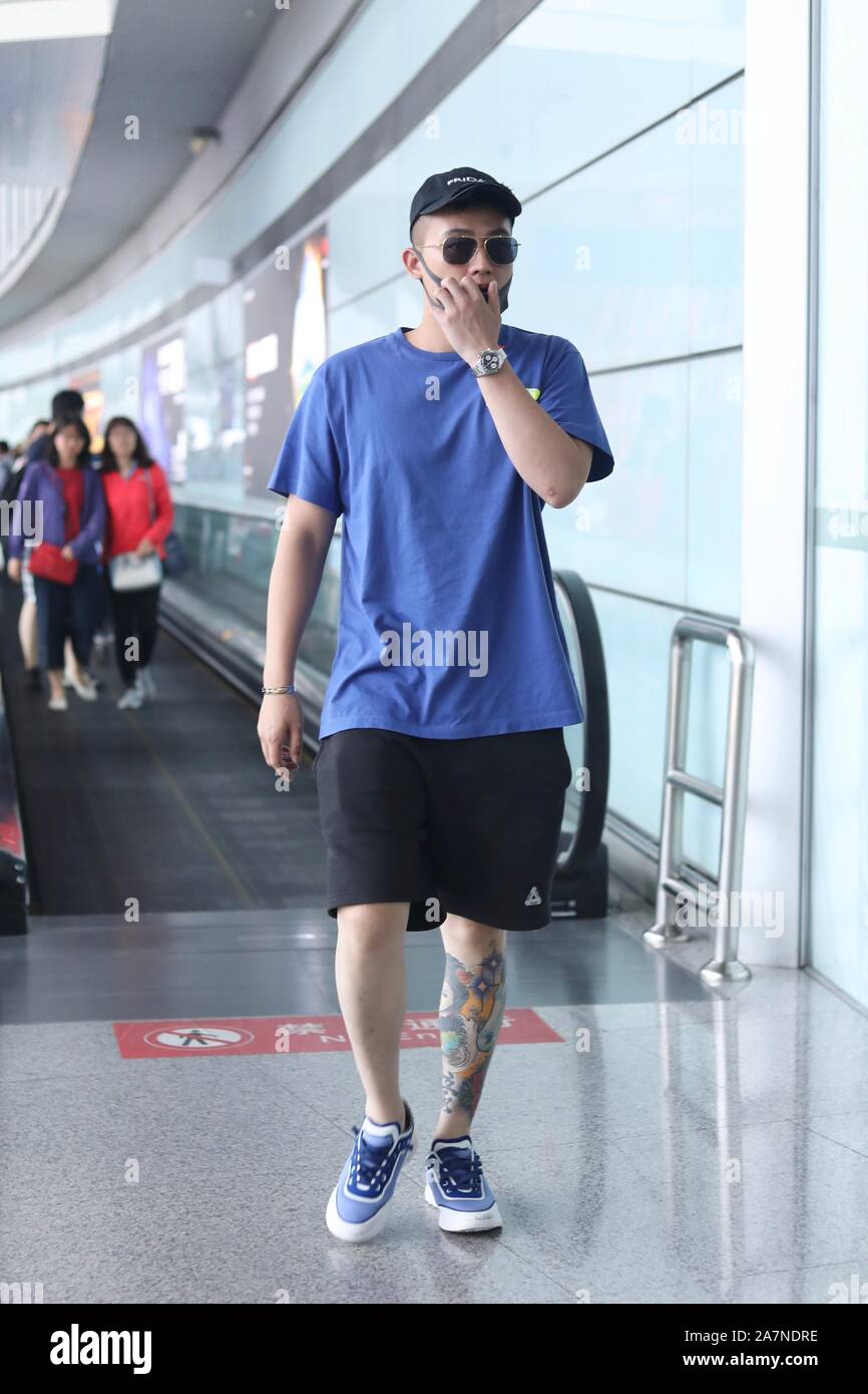Chinese actor and singer Ohu Ou Hao arrives at the Beijing Capital ...
