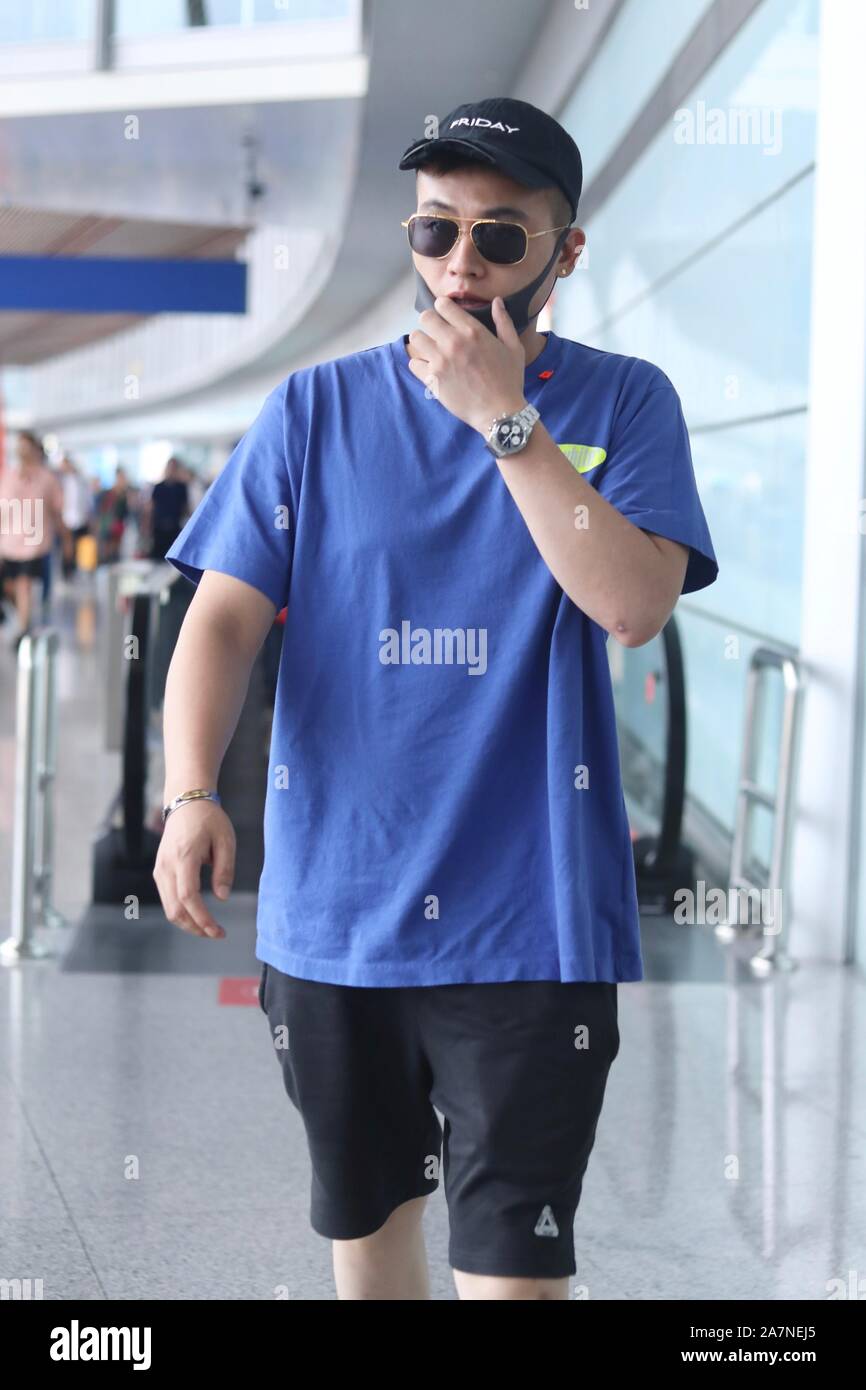 Chinese actor and singer Ohu Ou Hao arrives at the Beijing Capital ...