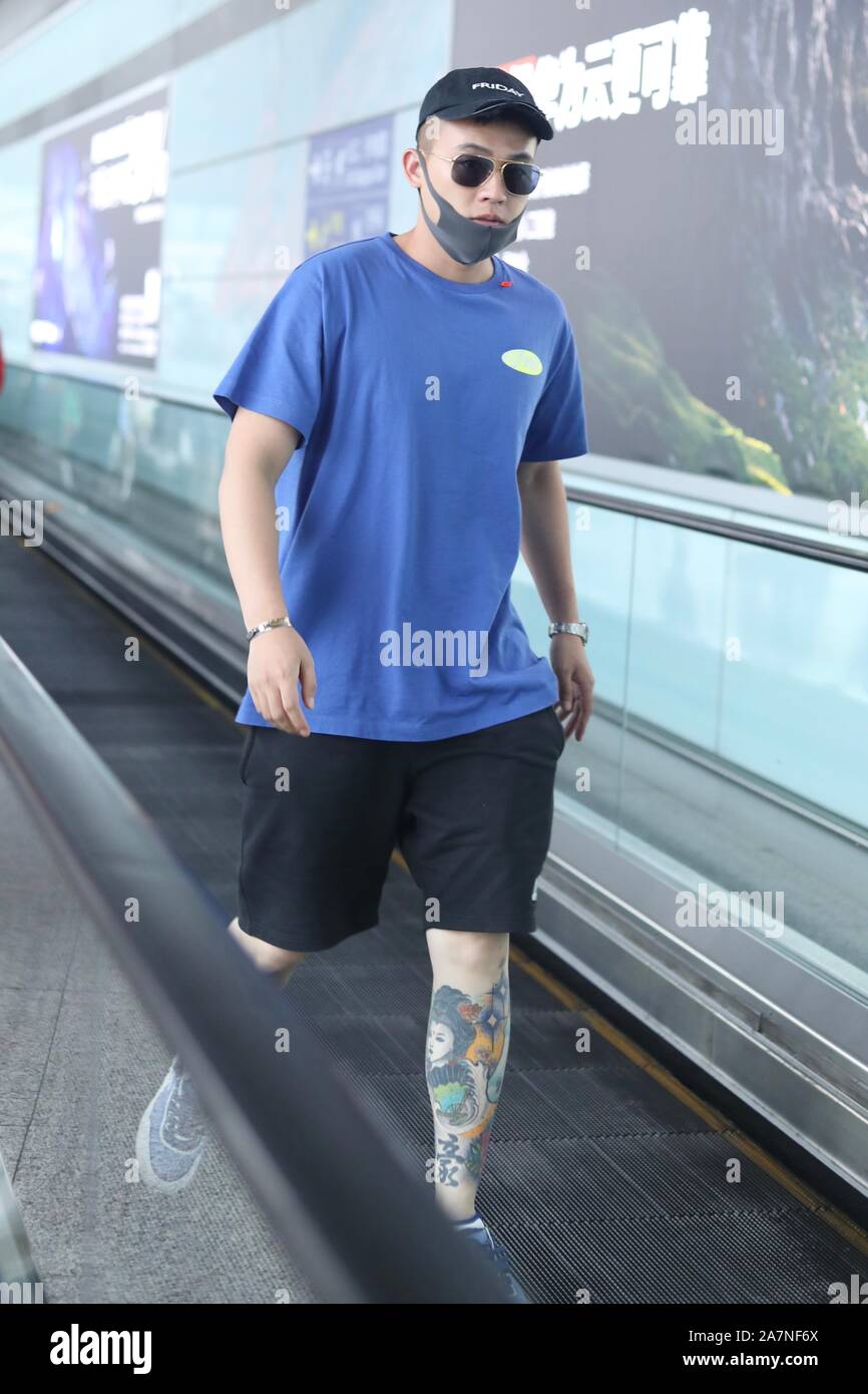 Chinese actor and singer Ohu Ou Hao arrives at the Beijing Capital ...