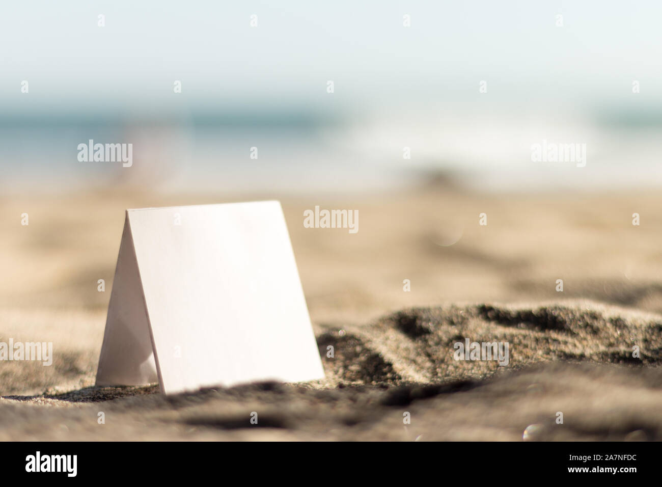 Black sticky notes on a beach Stock Photo - Alamy
