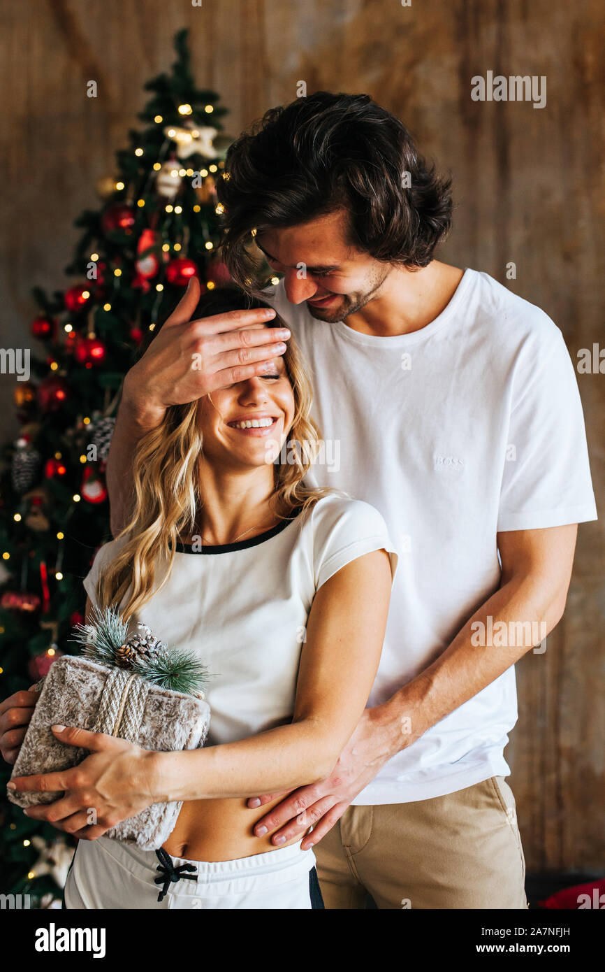 Woman hugging red box hi-res stock photography and images - Alamy