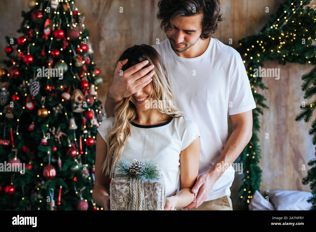 Woman hugging red box hi-res stock photography and images - Alamy
