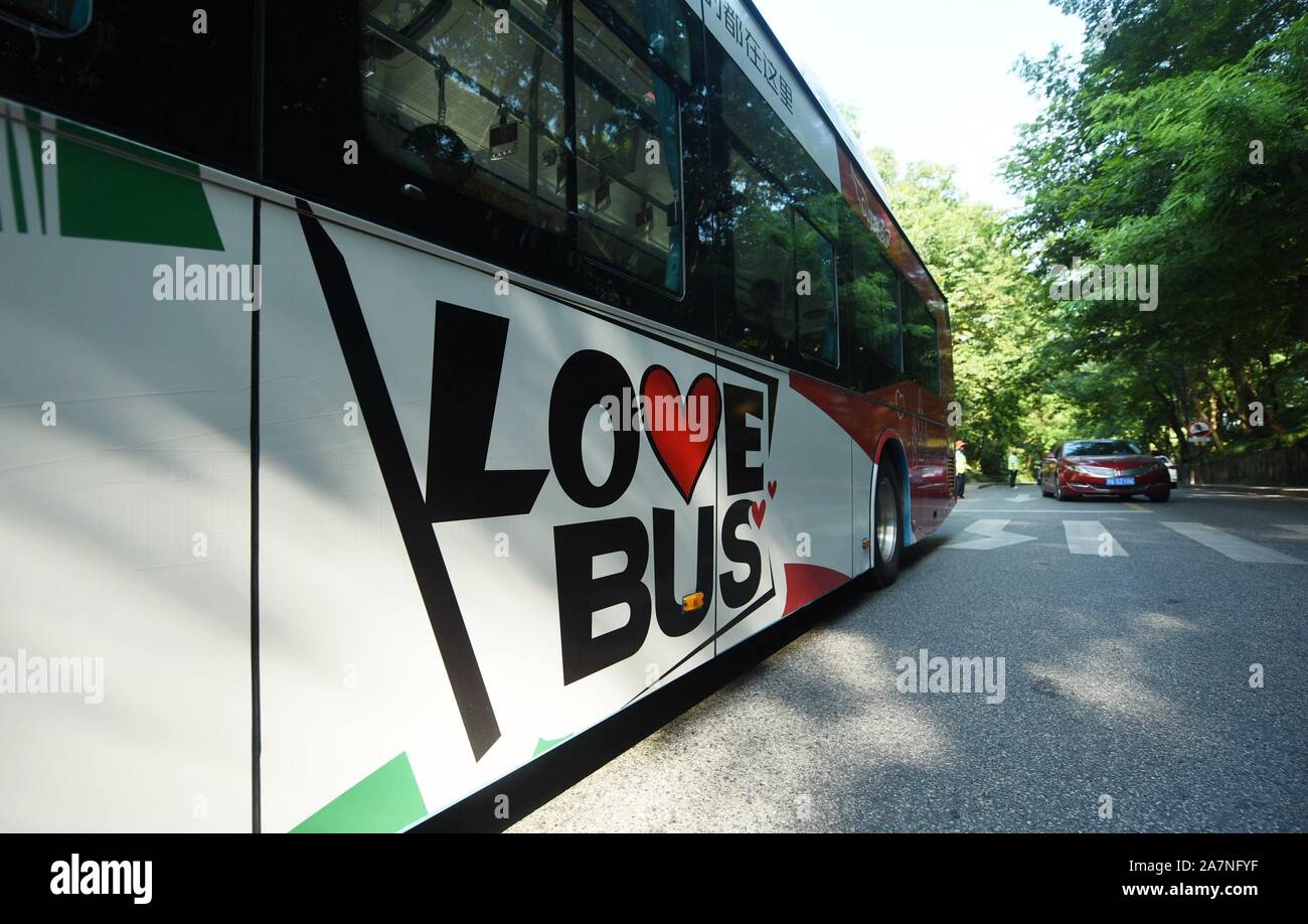 An electric bus of BYD of Hangzhou bus line 1314 is painted with "Love ...
